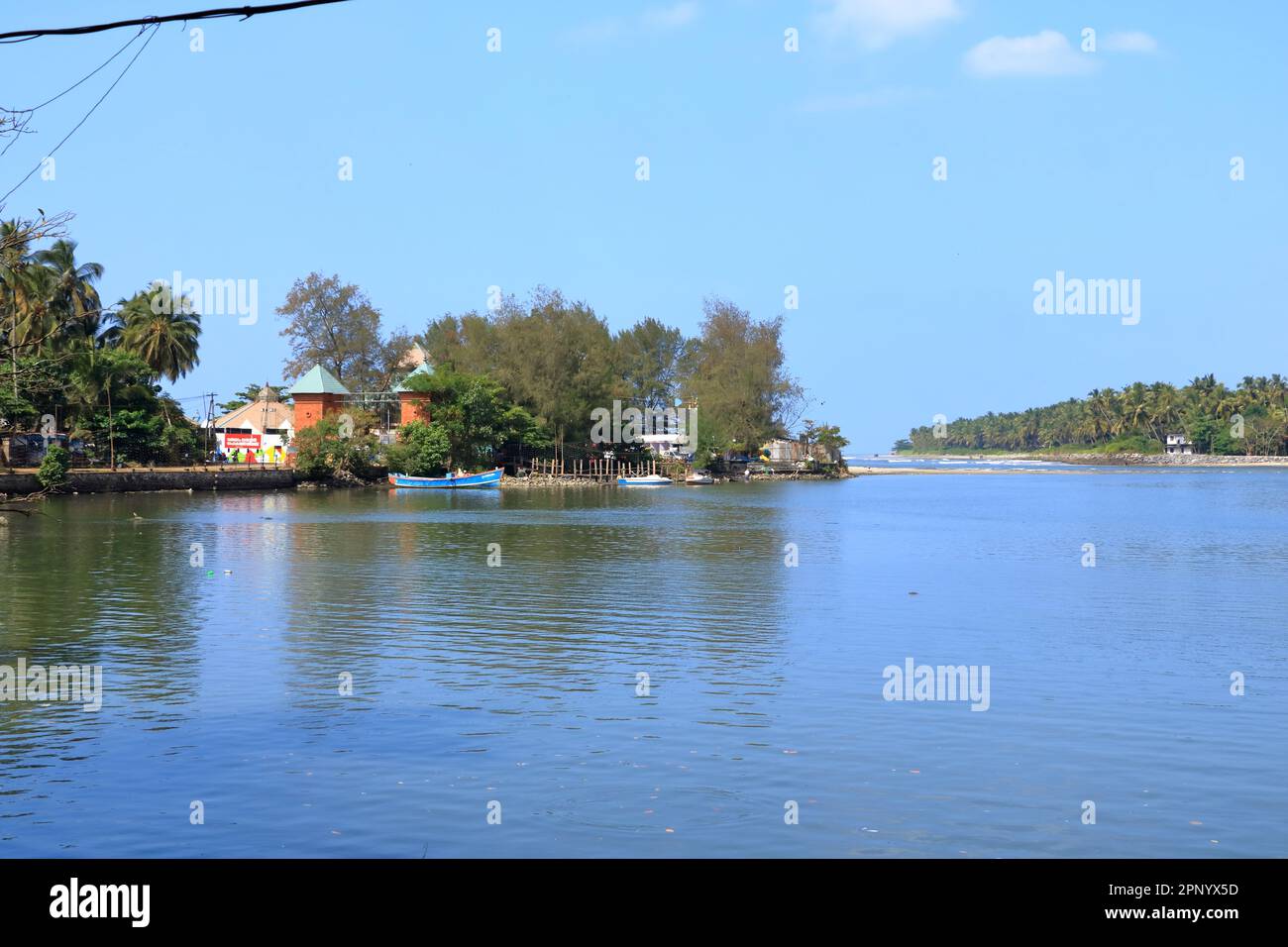 the lake and backwaters behind Dharmadam beach in Kannur, Kerala in ...