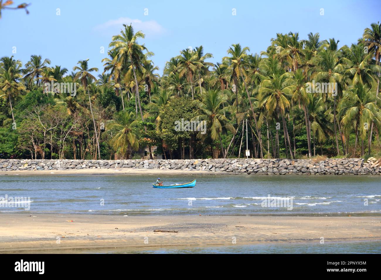 the lake and backwaters behind Dharmadam beach in Kannur, Kerala in ...