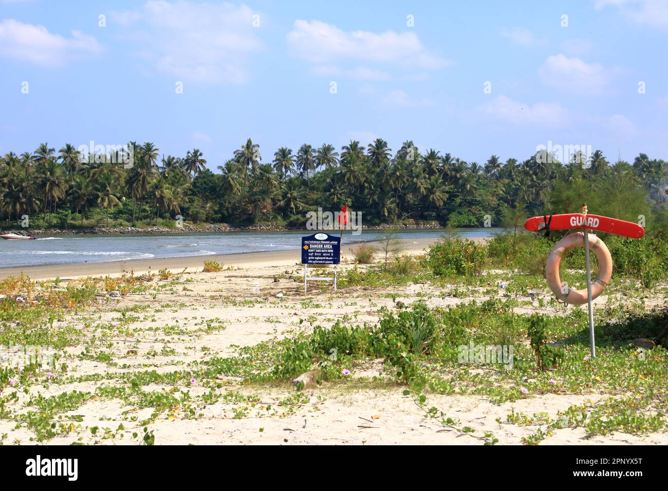 the lake and backwaters behind Dharmadam beach in Kannur, Kerala in ...
