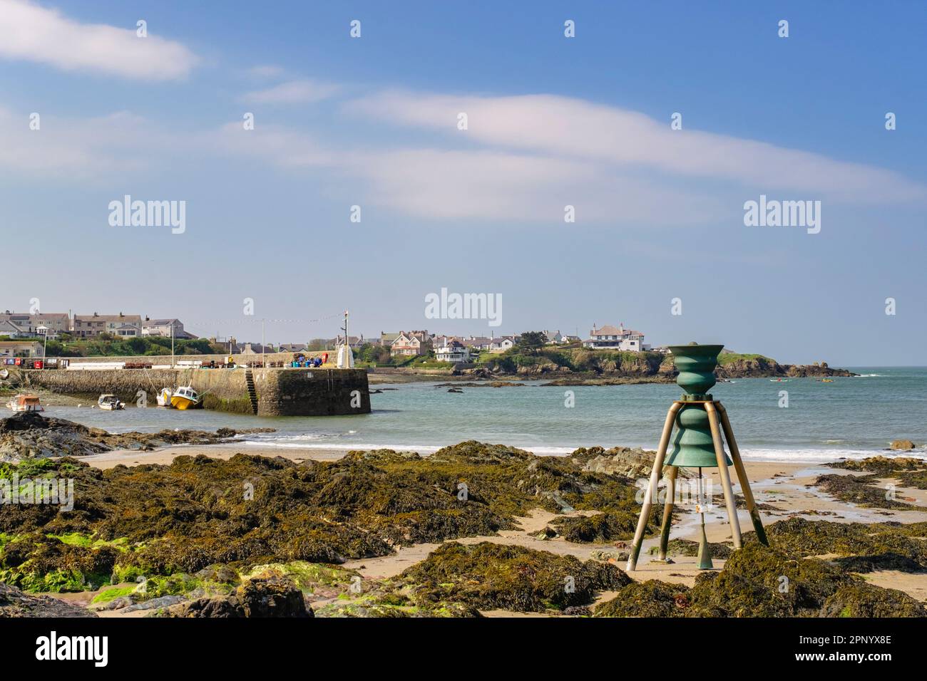 St Patrick's tide bell on the beach in Cemaes Bay, Isle of Anglesey ...