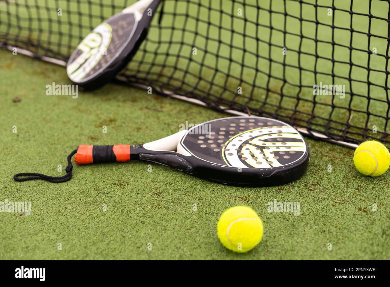 paddle sport on the paddle court, ball, rackets Stock Photo - Alamy
