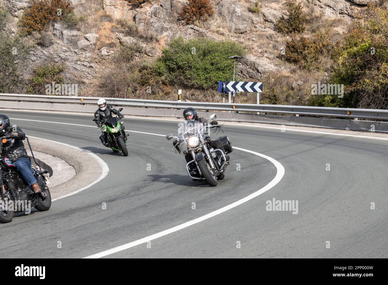 Photo of a motorcycle rally on the curvy roads of the mountains of La ...