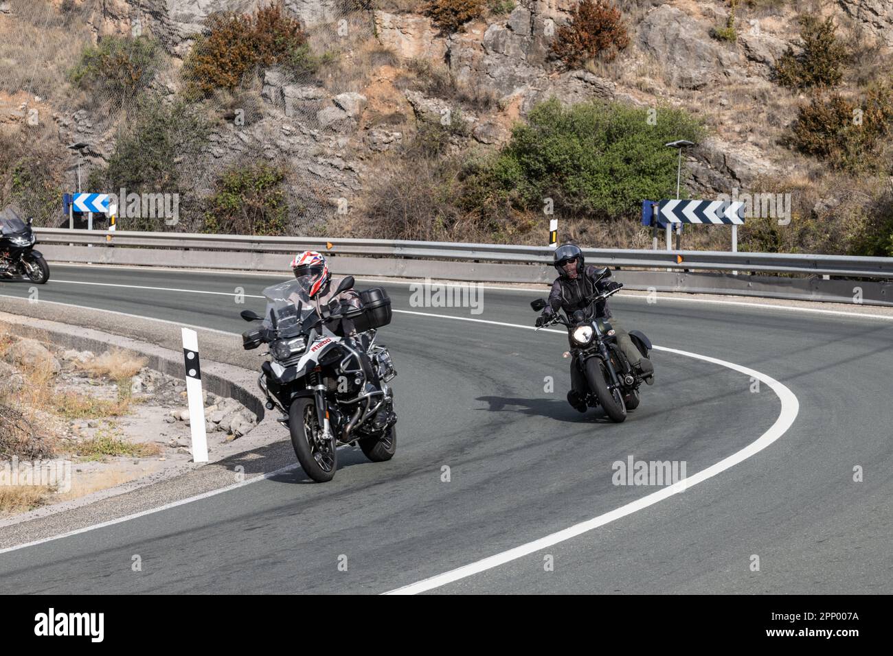 Photo of a motorcycle rally on the curvy roads of the mountains of La ...
