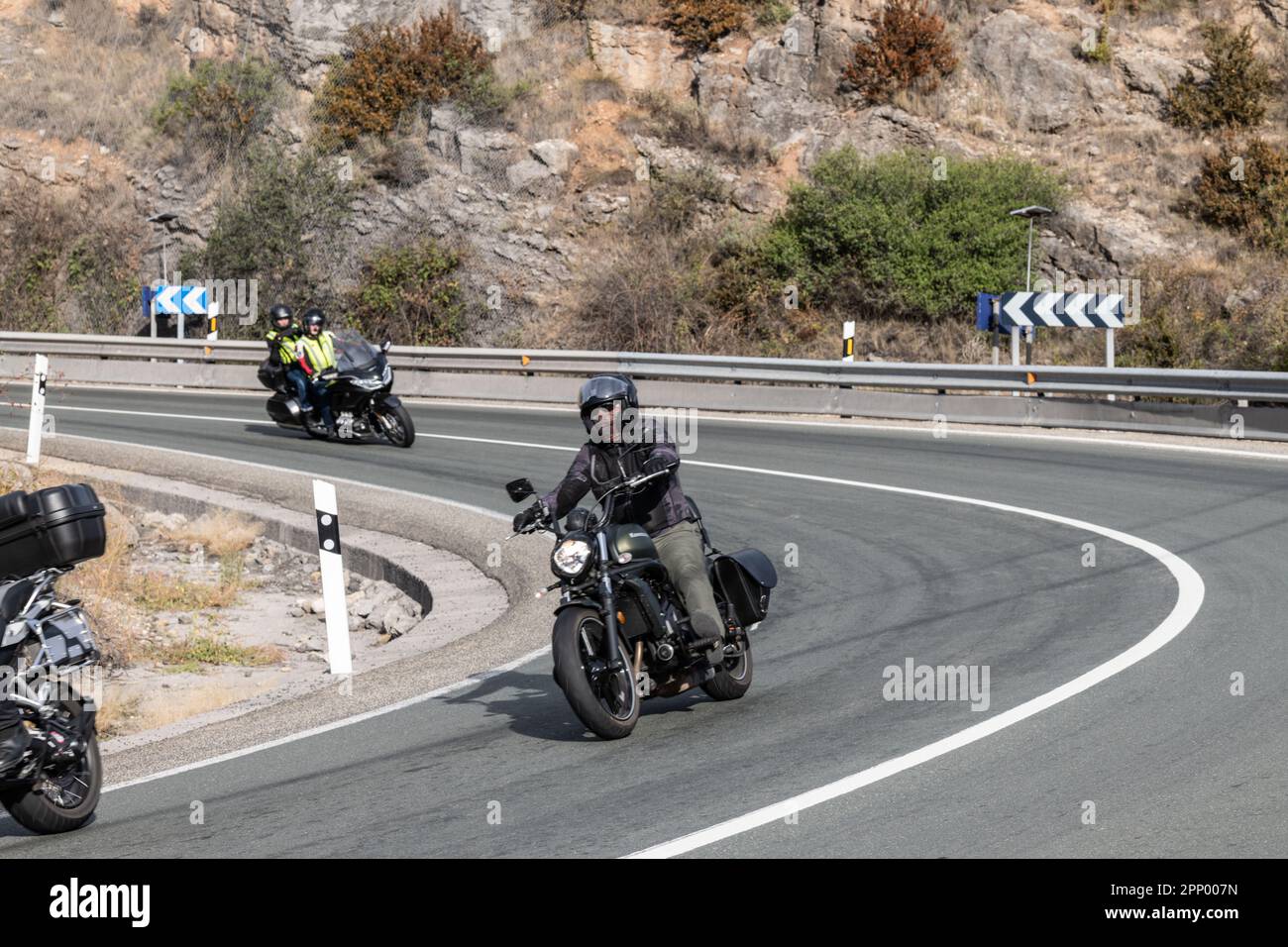 Photo of a motorcycle rally on the curvy roads of the mountains of La ...