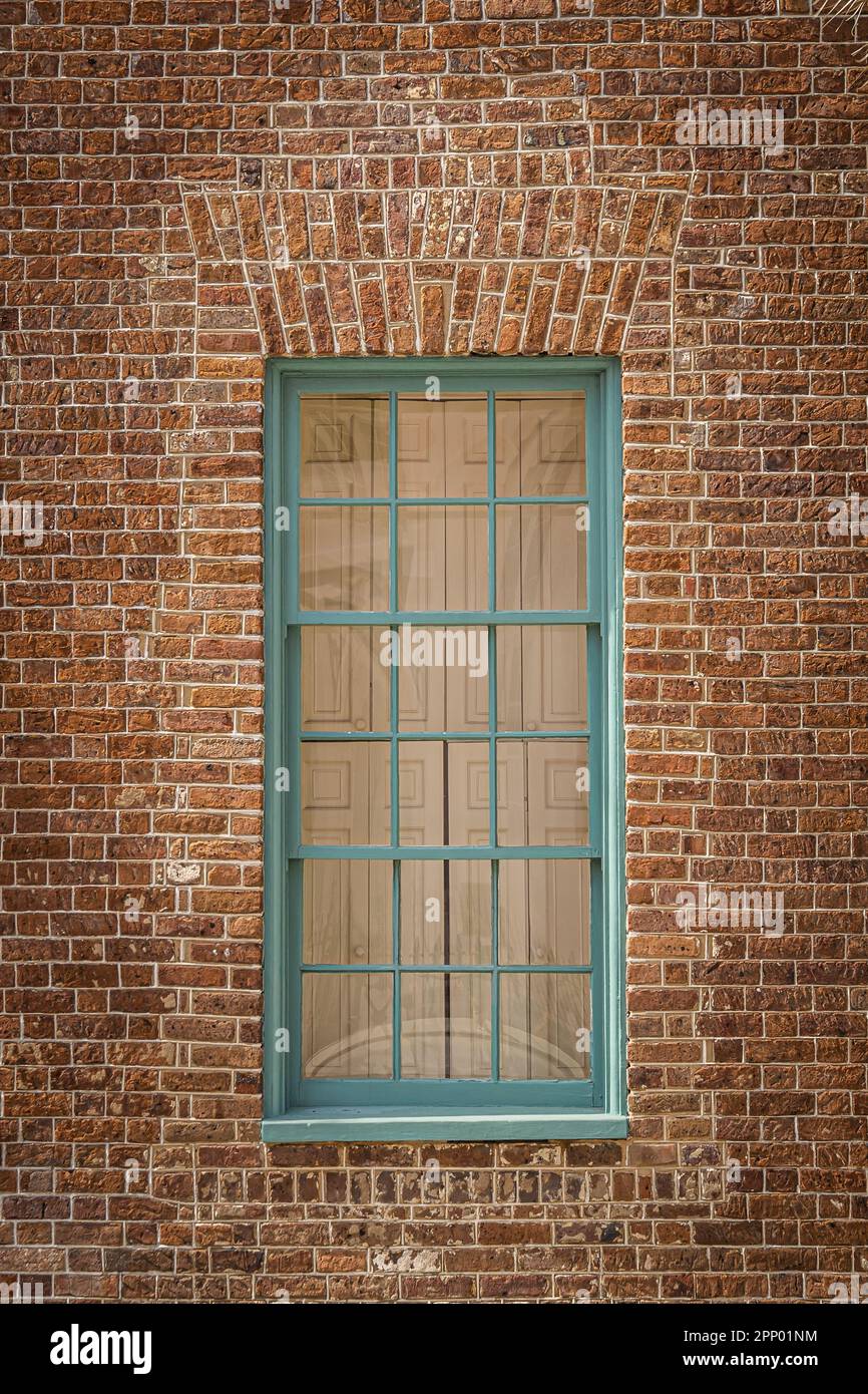 Close up of the color windows of a colonial era home in Charleston ...