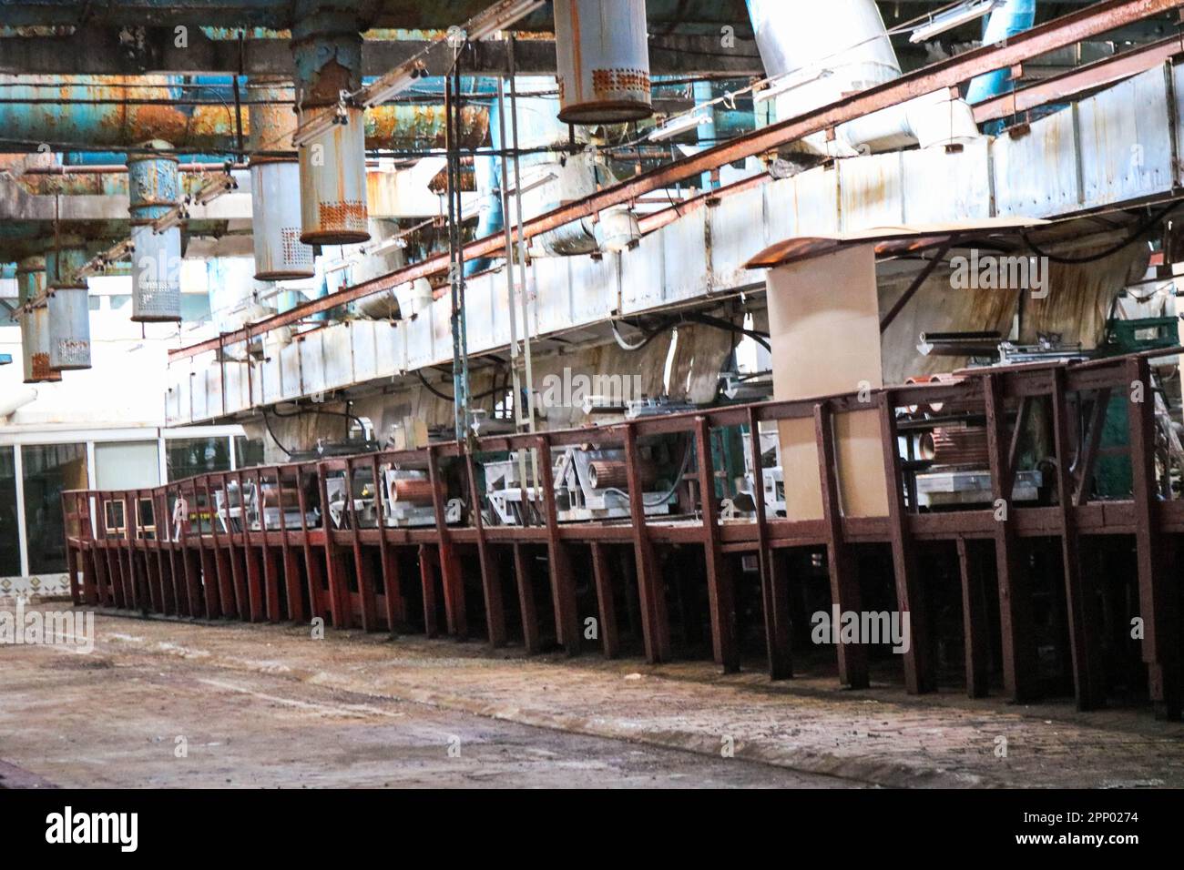 Old rusty closed peeling shop at an abandoned industrial obsolete ...