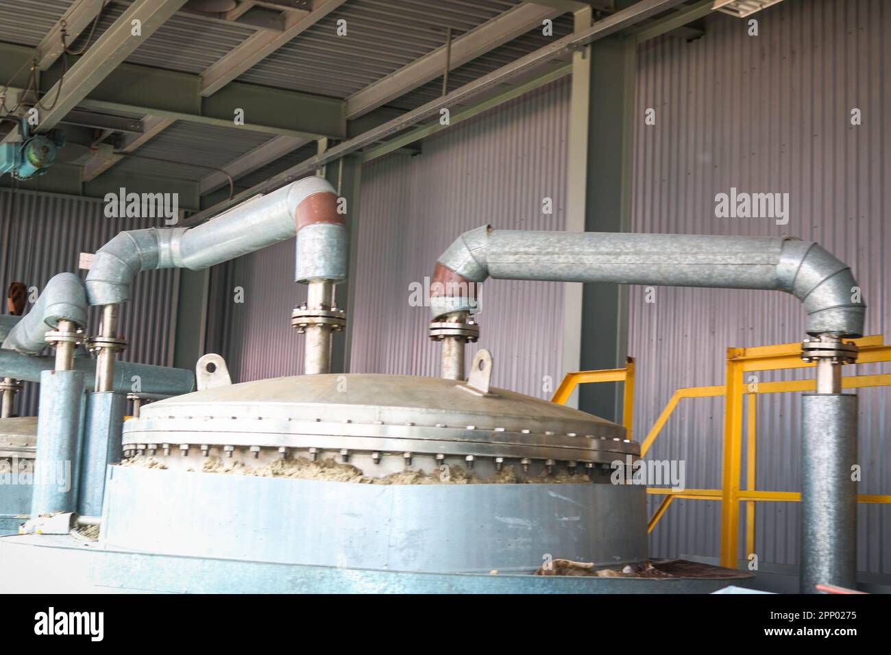 Stainless steel metal lid with bolts and studs, top of the heat ...