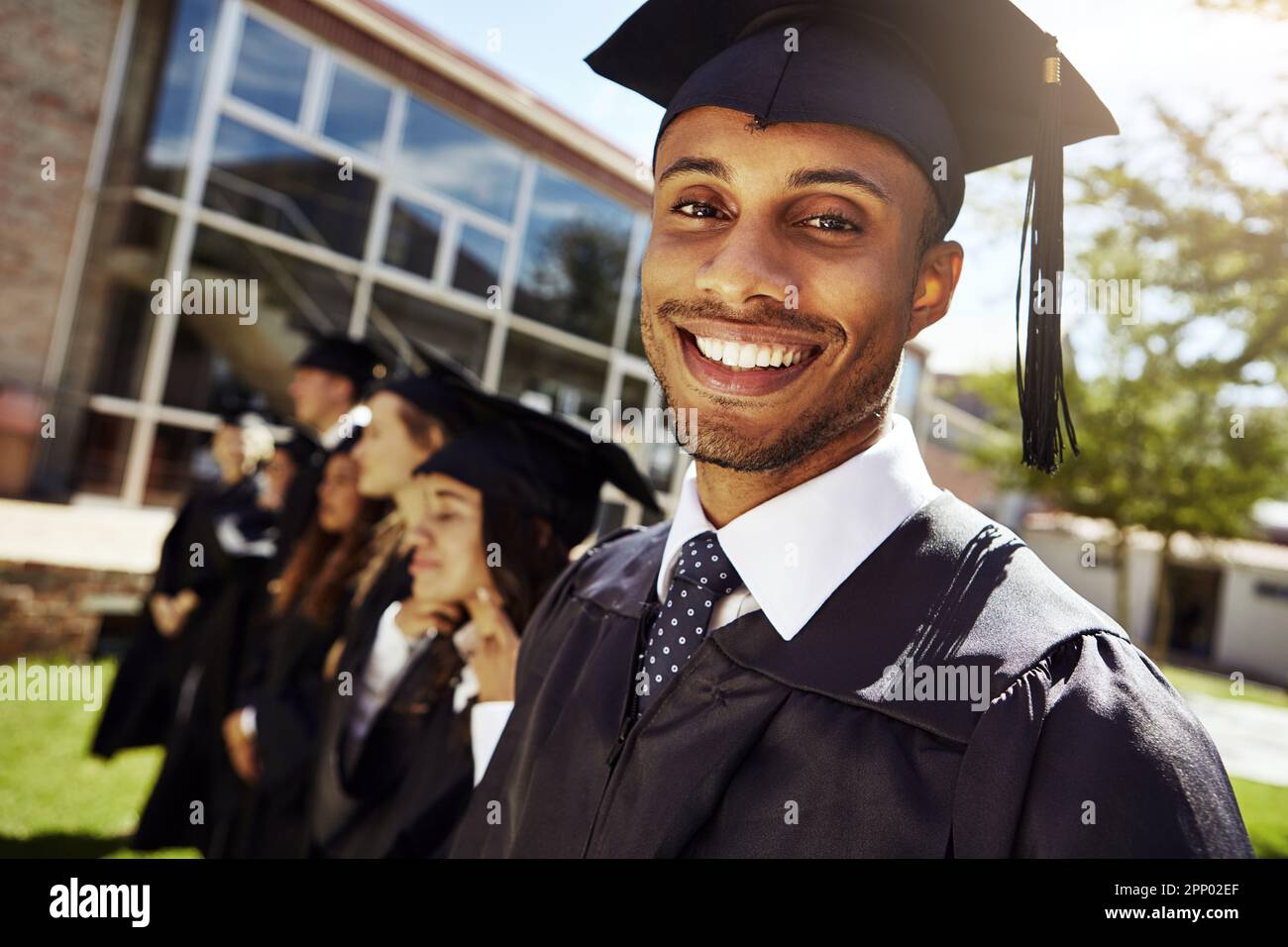 Were educated and ready to go. Portrait of a smiling university student ...