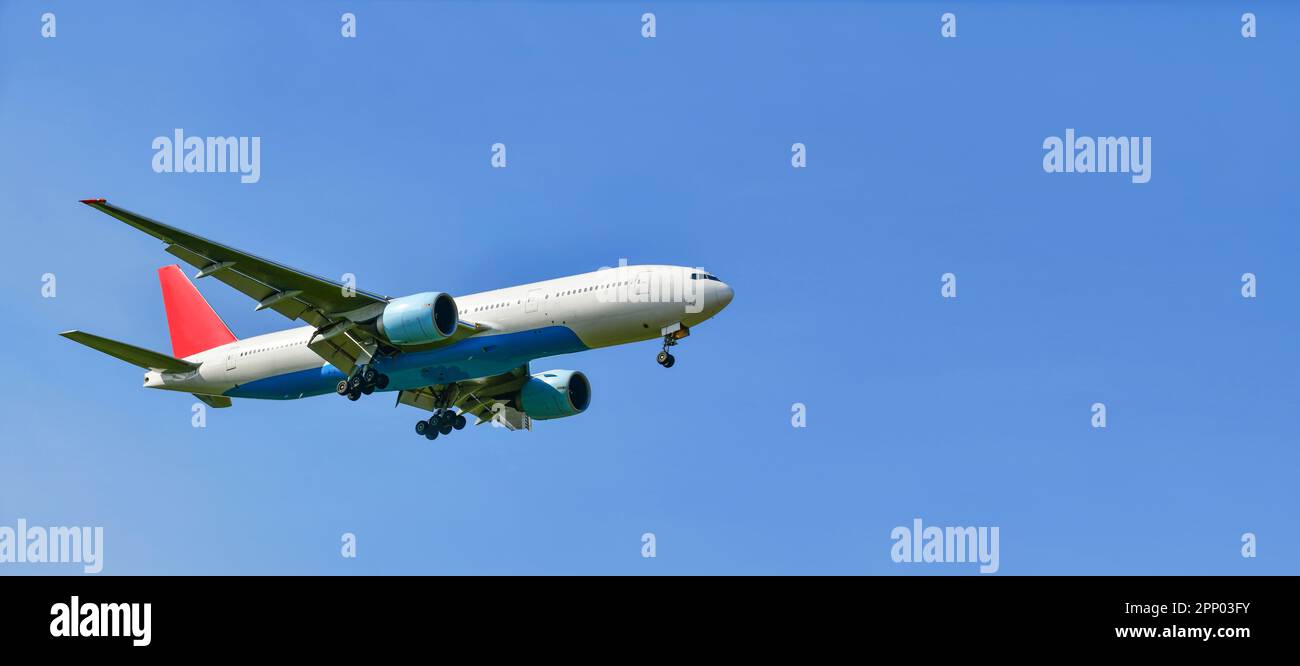 Air plane is flying.With blue sky, Panoramic shot Stock Photo - Alamy