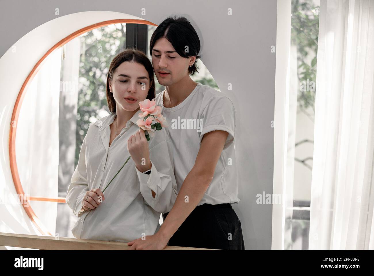 Lovers sharing gifts on special and memorable anniversaries. A couple ...