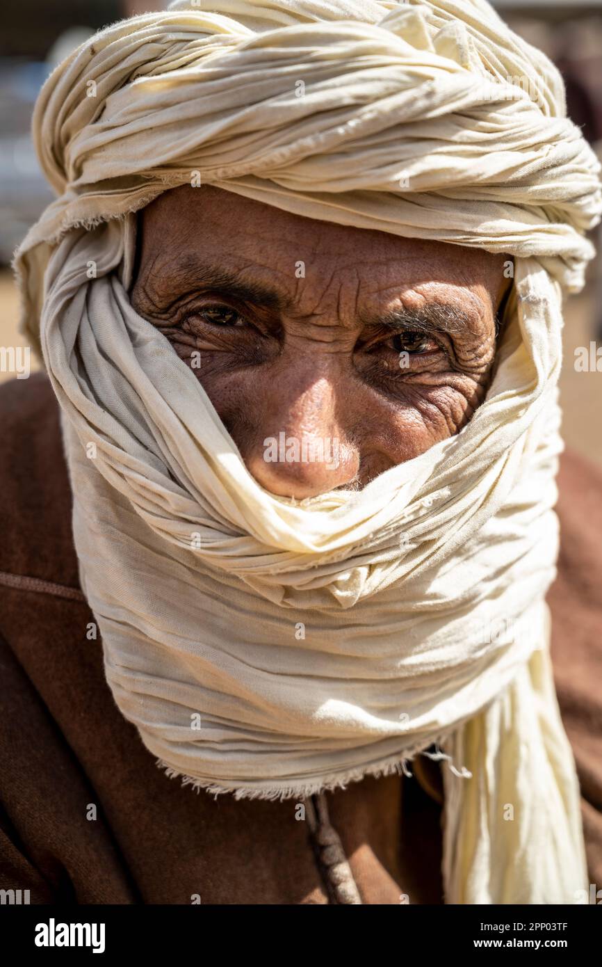 Portrait of a berber man dressed in the traditional djellaba and turban ...
