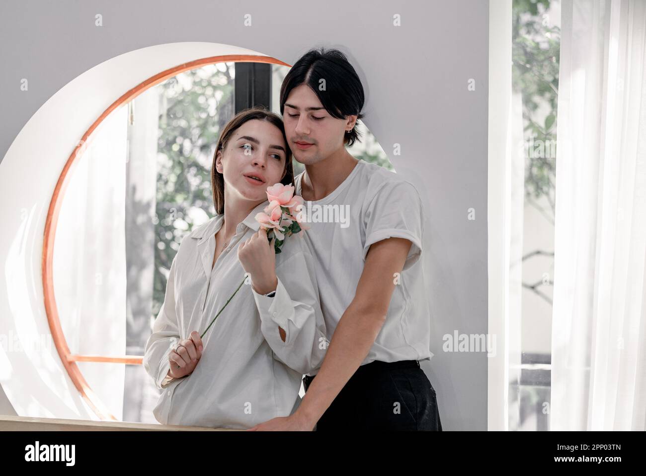 Lovers sharing gifts on special and memorable anniversaries. A couple ...