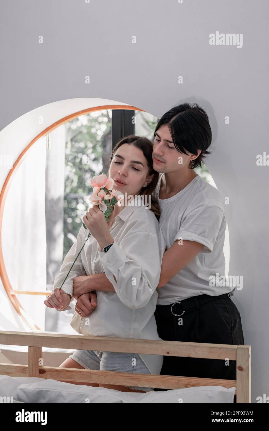 Lovers sharing gifts on special and memorable anniversaries. A couple ...