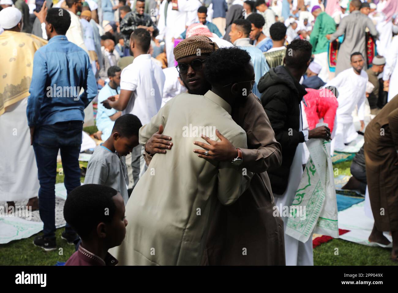 Muslim worshippers hug each other after praying on the first day of Eid ...