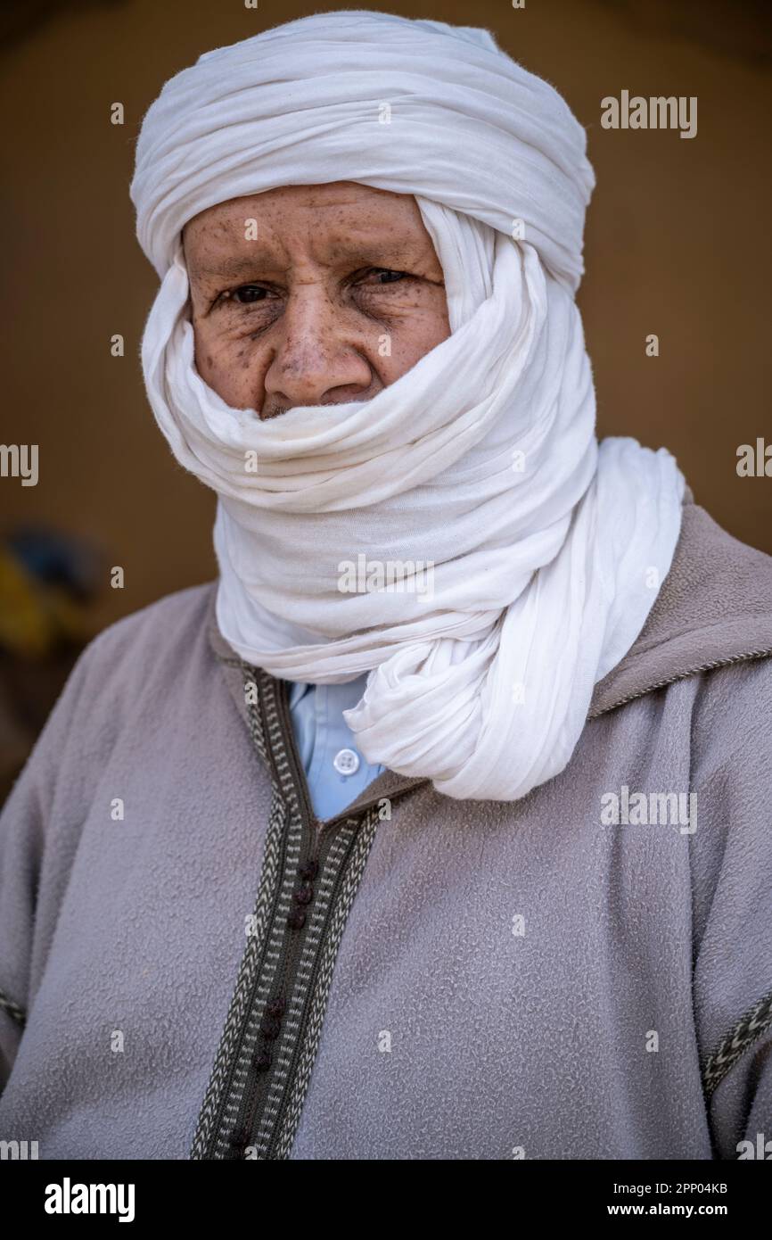 Portrait of a berber man dressed in the traditional djellaba and turban ...