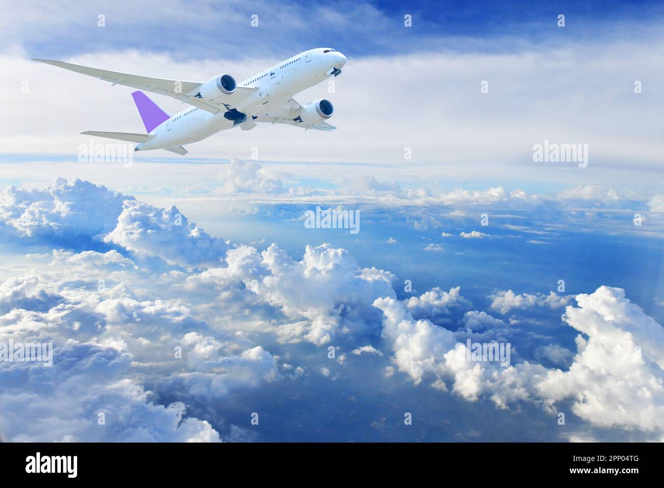 Flight of the plane in the sky Stock Photo - Alamy