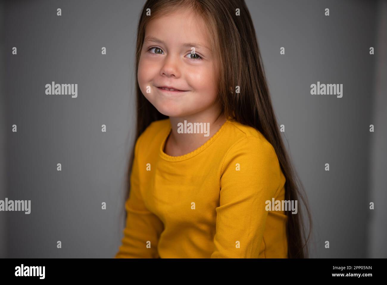 Adorable six years old girl isolated on white studio background, pretty ...