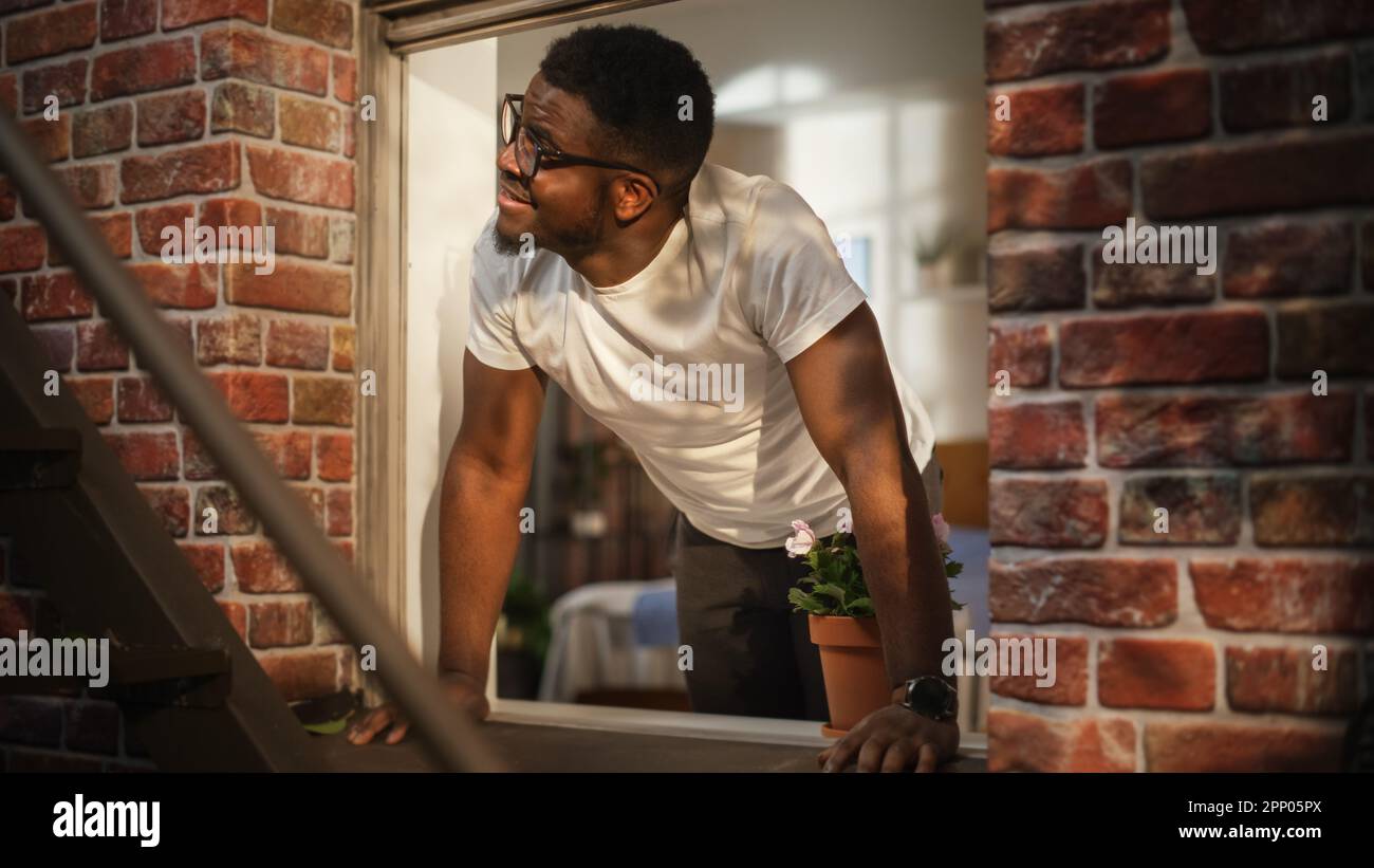 Man opening a window summer hi-res stock photography and images - Alamy