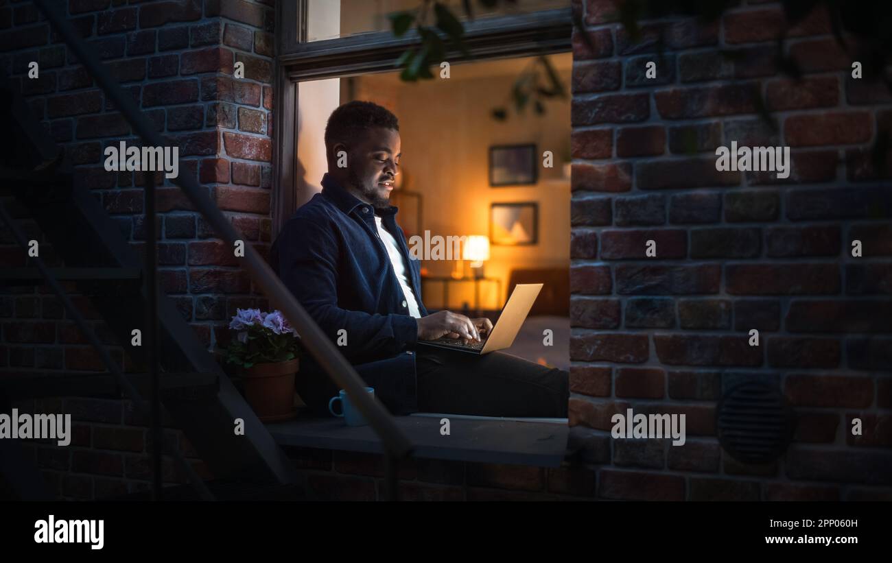 Young Handsome Black Man Working from Home on Laptop Computer in ...
