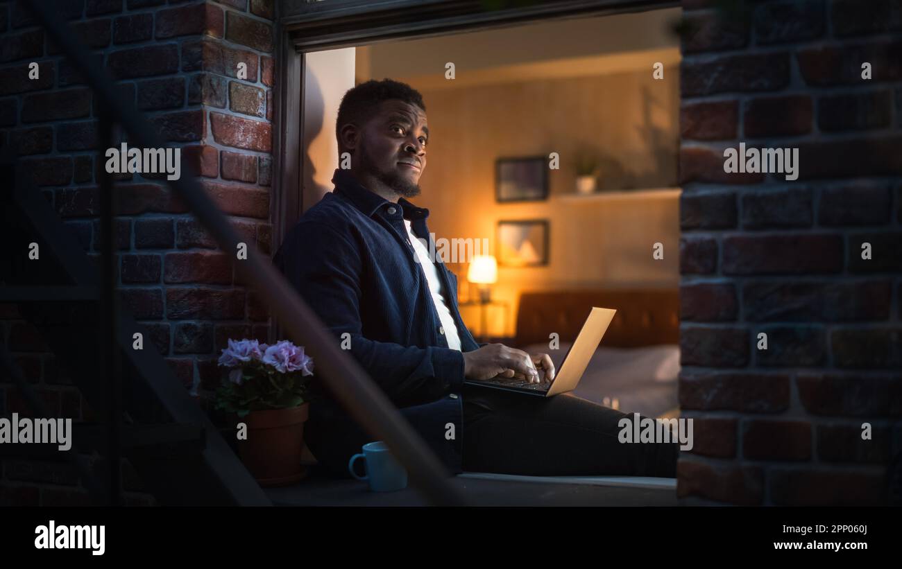Young Handsome Black Man Working from Home on Laptop Computer in ...