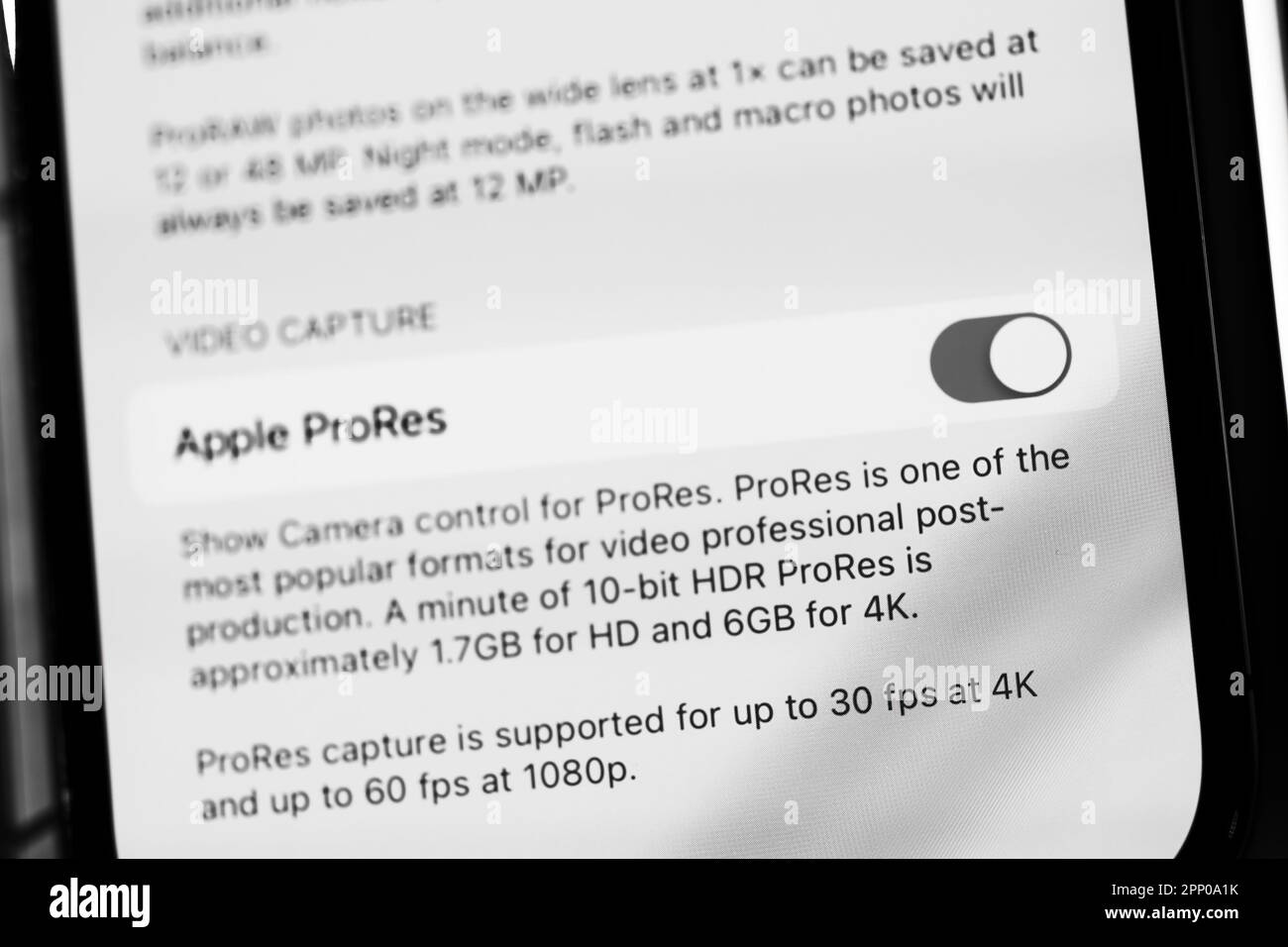 Paris, France - Sep 17, 2022: Setting up the new iPhone 14 Pro to shoot videos with an Apple ...