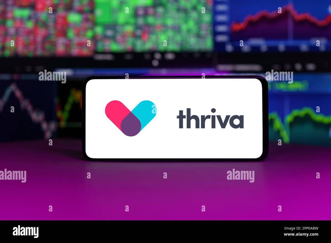 Thriva Company financial success in front of charts background Stock Photo - Alamy
