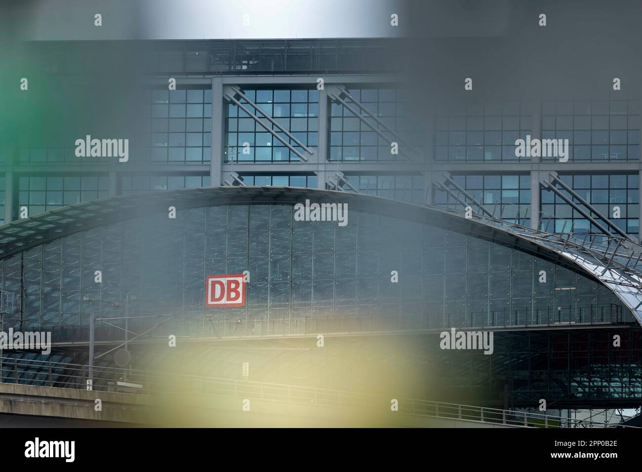 The main train station with the Deutsche Bahn (DB) logo photographed ...