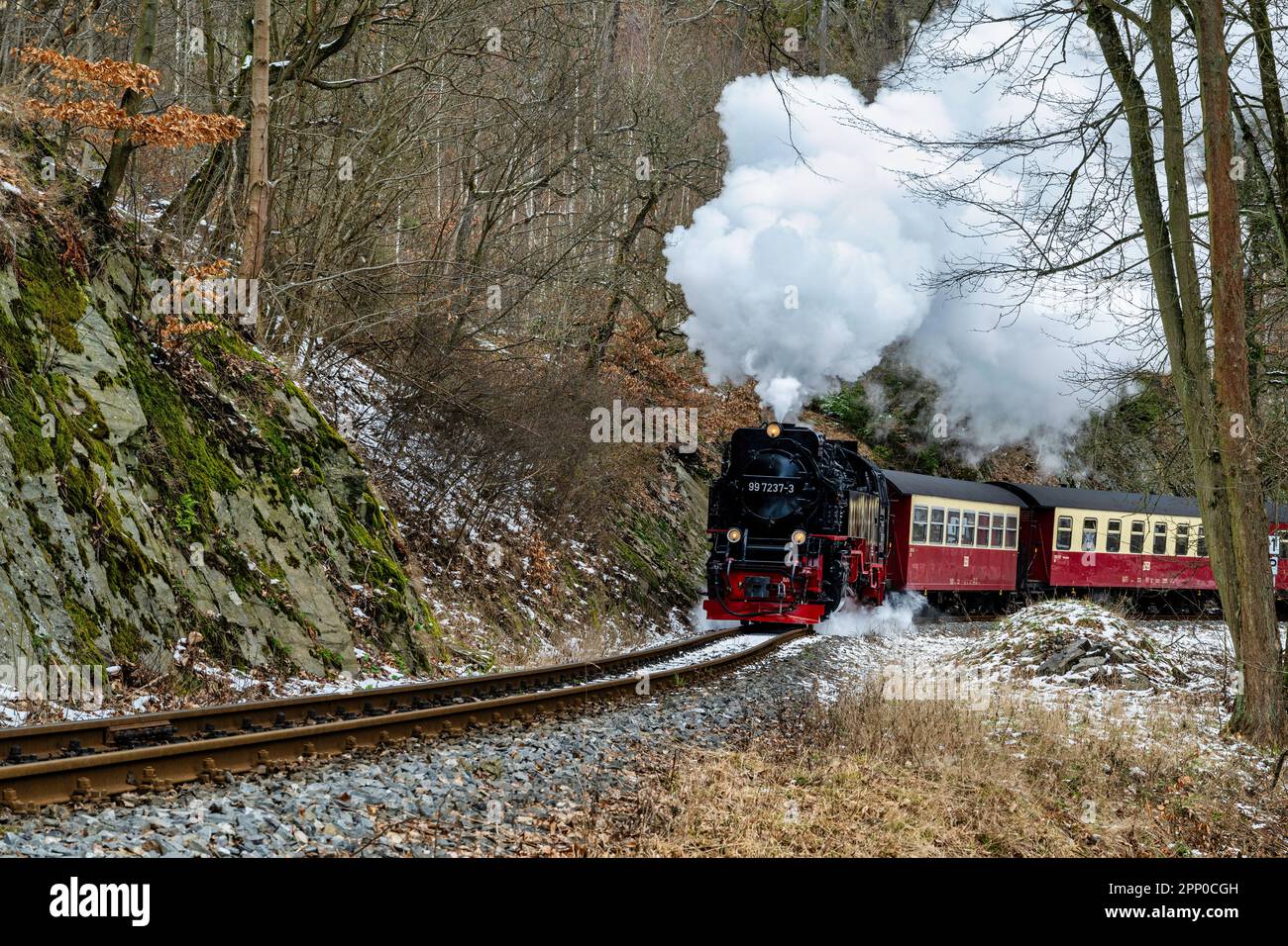 Old steam locomotive in the Harz Mountains in Germany driving through ...
