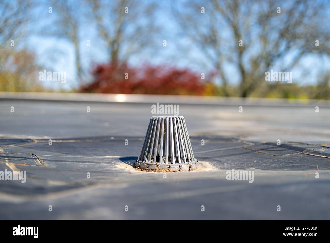 Clean metal caged roof drain on a flat EPDM roof Stock Photo - Alamy