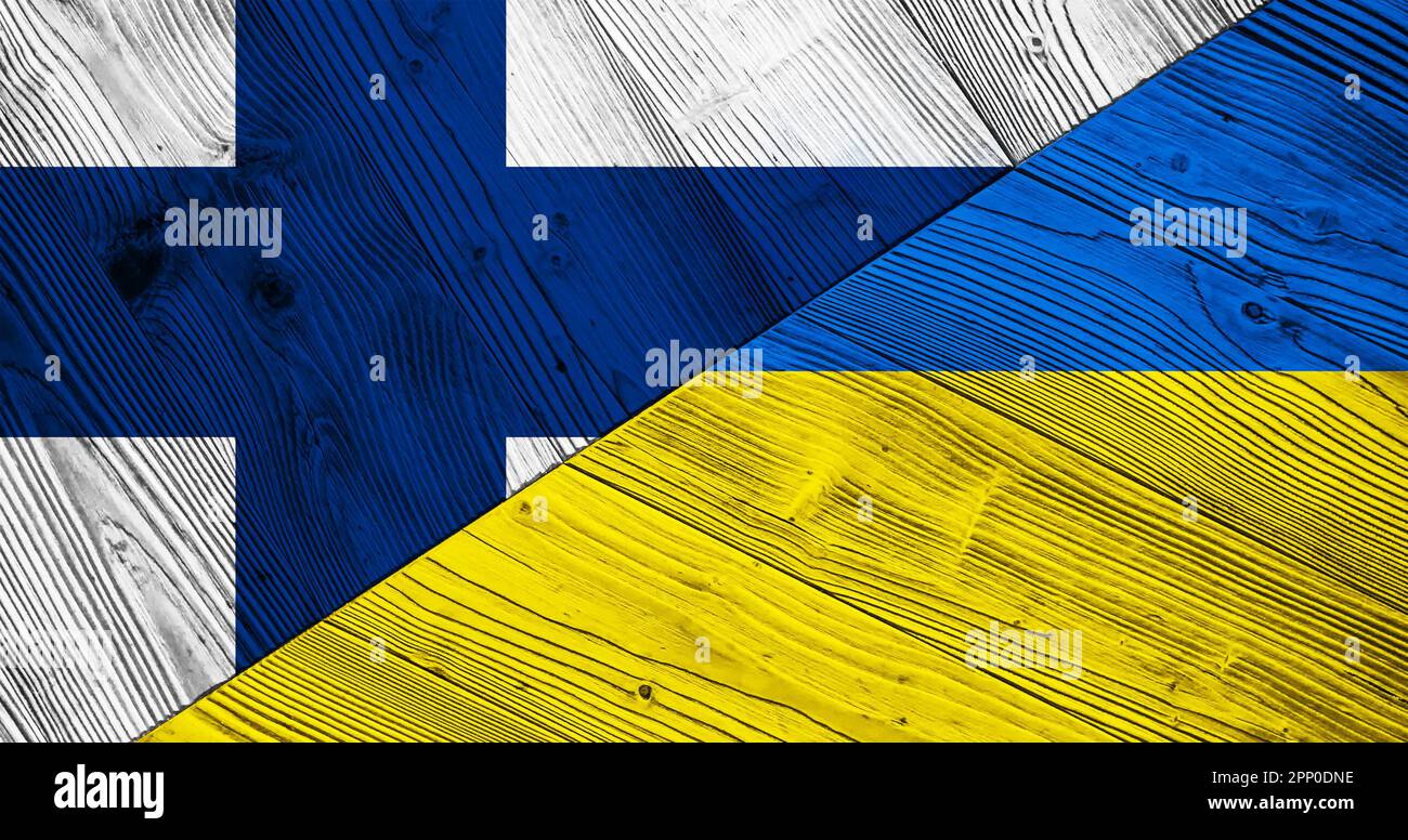 Background with flag of Finland and Ukraine on split wooden table. 3d ...