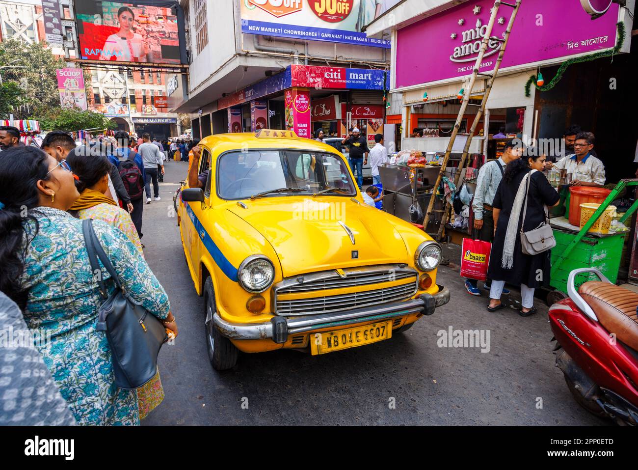 Typical vintage Ambassador yellow cab taxi in the street in the New ...