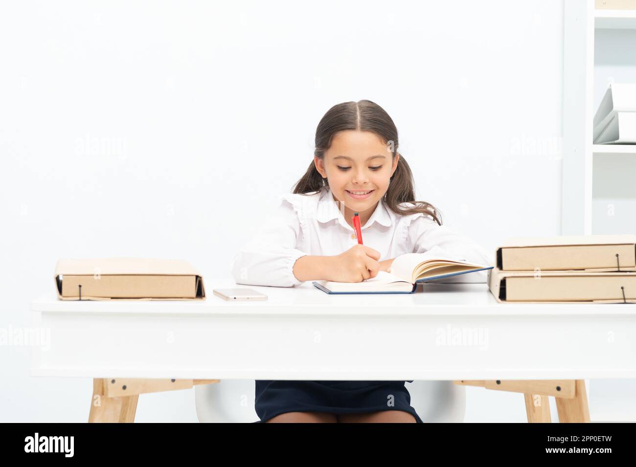 cute teen school girl noting in classroom. teen school girl noting at ...