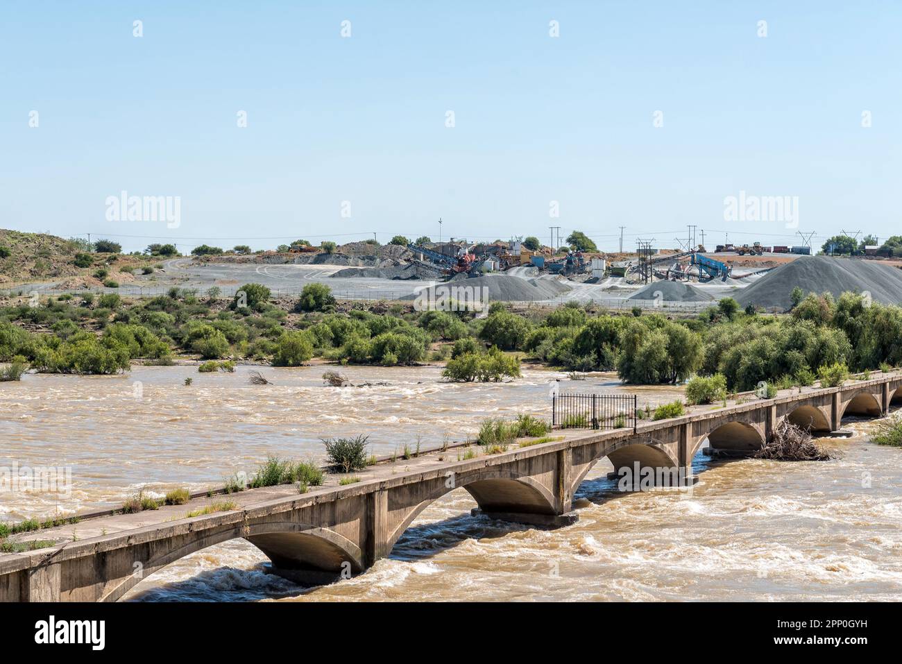 Douglas, South Africa - Mar 1, 2023: Old road bridge over a flooded ...