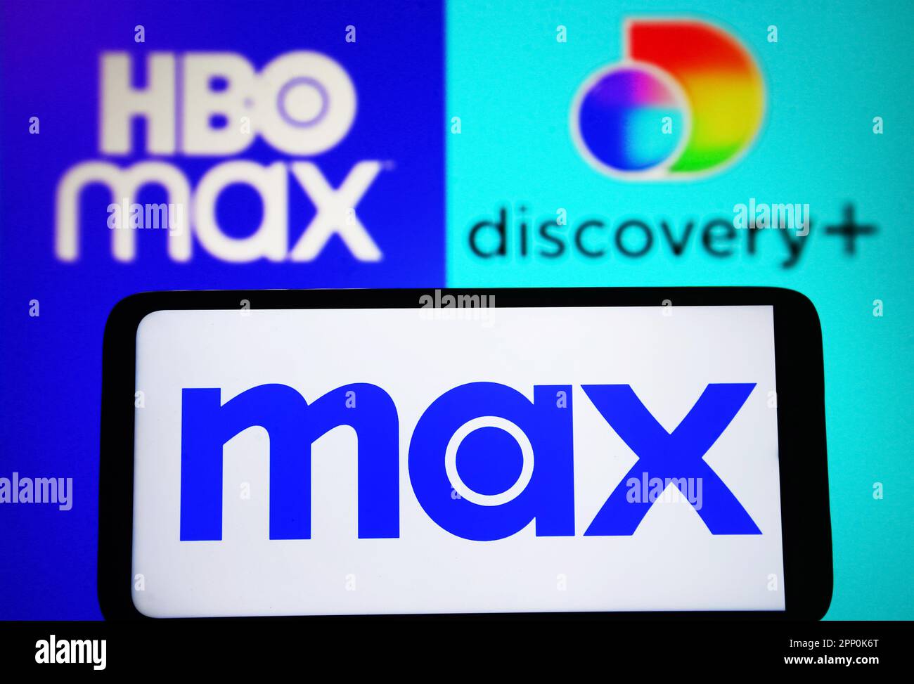 In this photo illustration, Max logo is seen on a smartphone and HBO ...