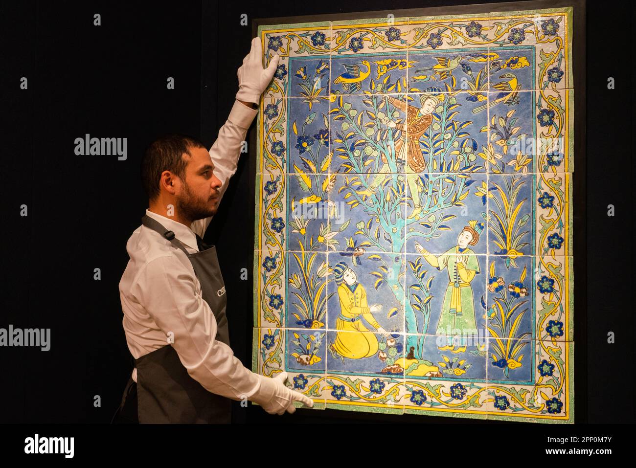 London UK. 21 April 2023.A LARGE AND IMPRESSIVE SAFAVID CUERDA SECA ...