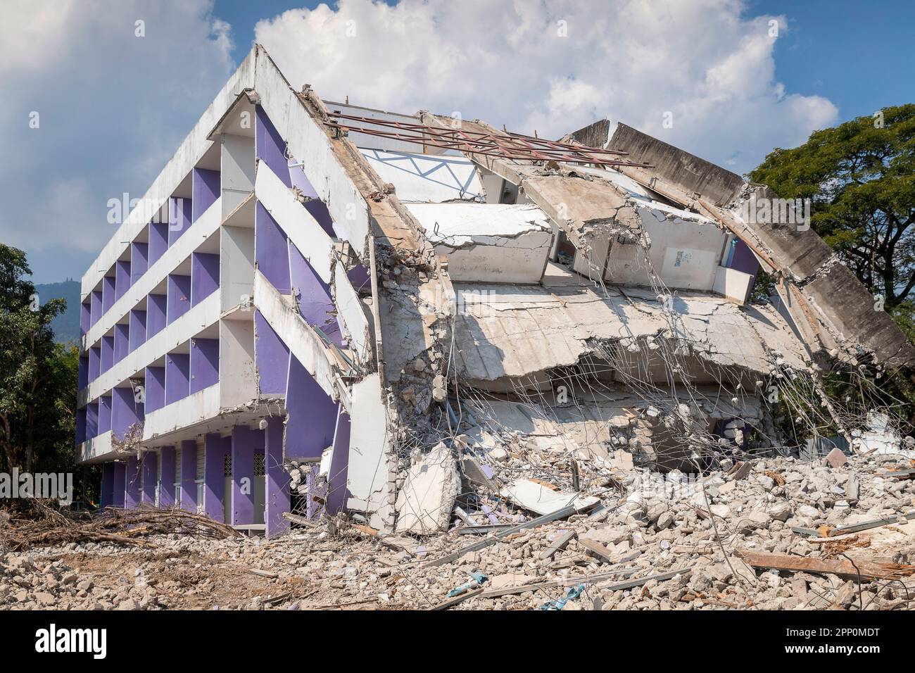 Debris and destroyed building that collapsed from the earthquake Stock Photo - Alamy