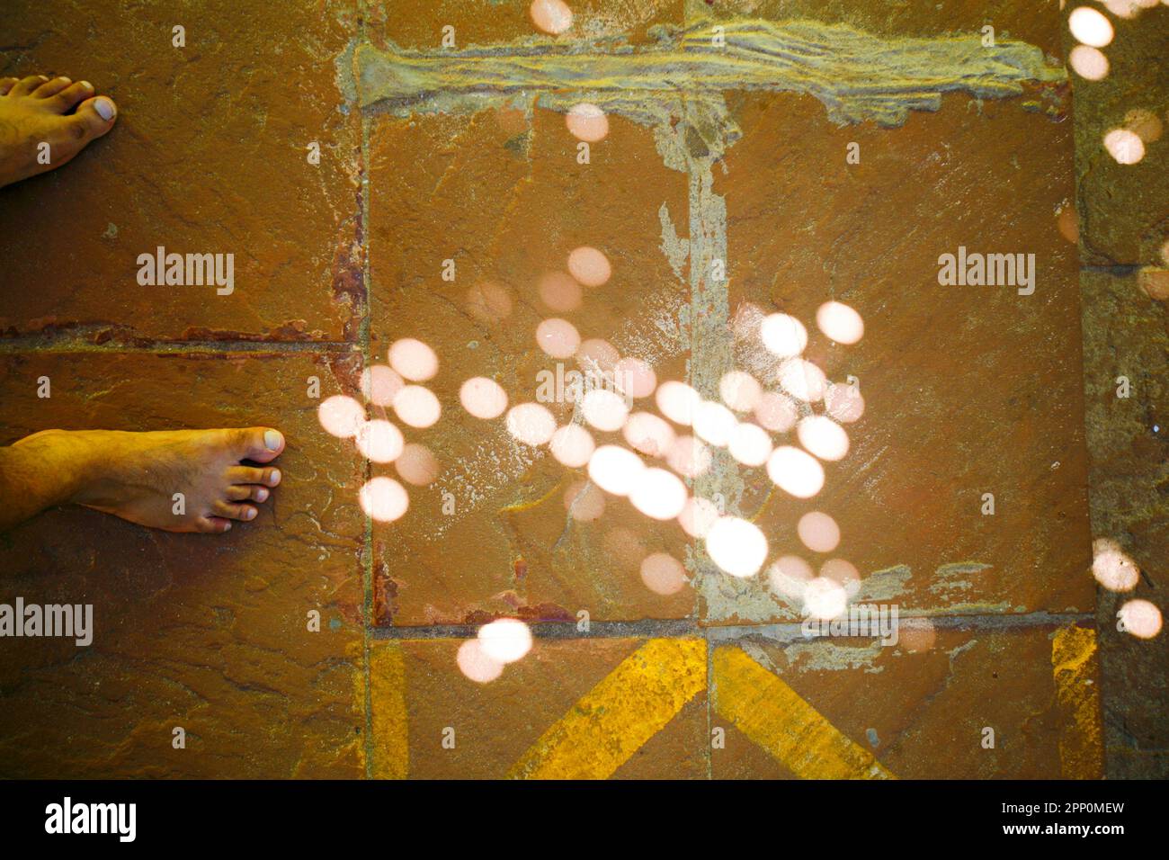 Sun light flittering in through the roof Stock Photo - Alamy