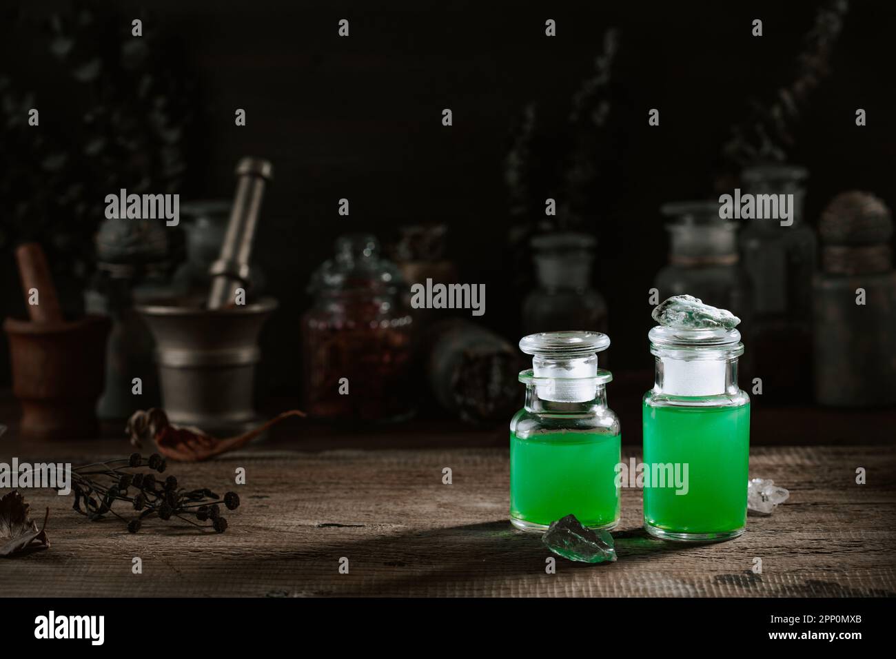 Witchcraft still life concept with potion, herbs ingredients candles ...