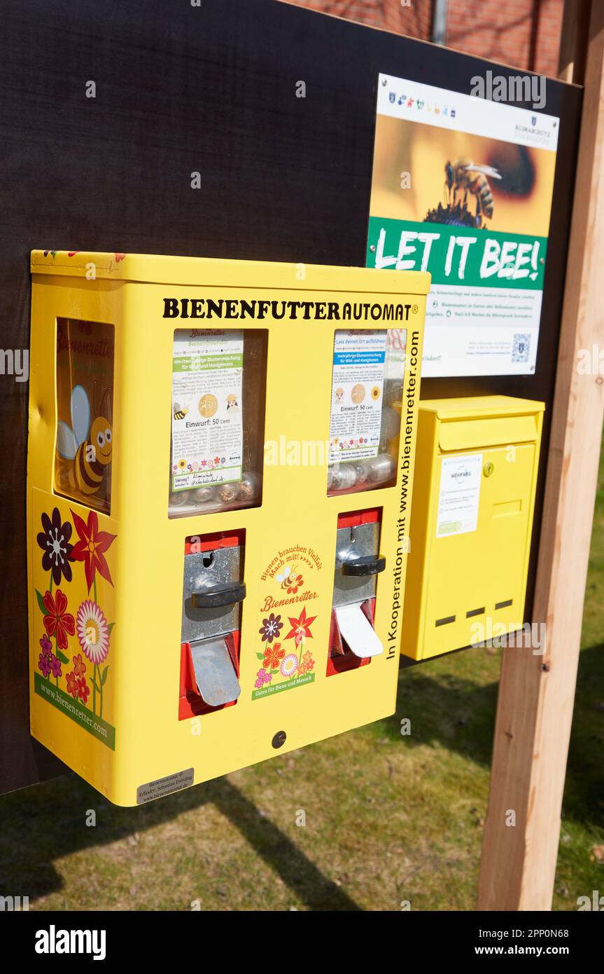 Stockelsdorf, Germany. 21st Apr, 2023. A yellow vending machine with ...