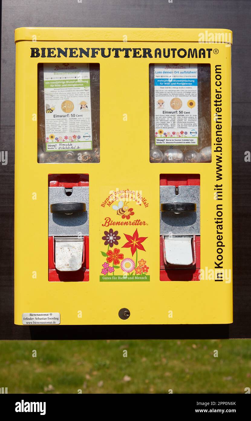 Stockelsdorf, Germany. 21st Apr, 2023. A yellow vending machine with ...