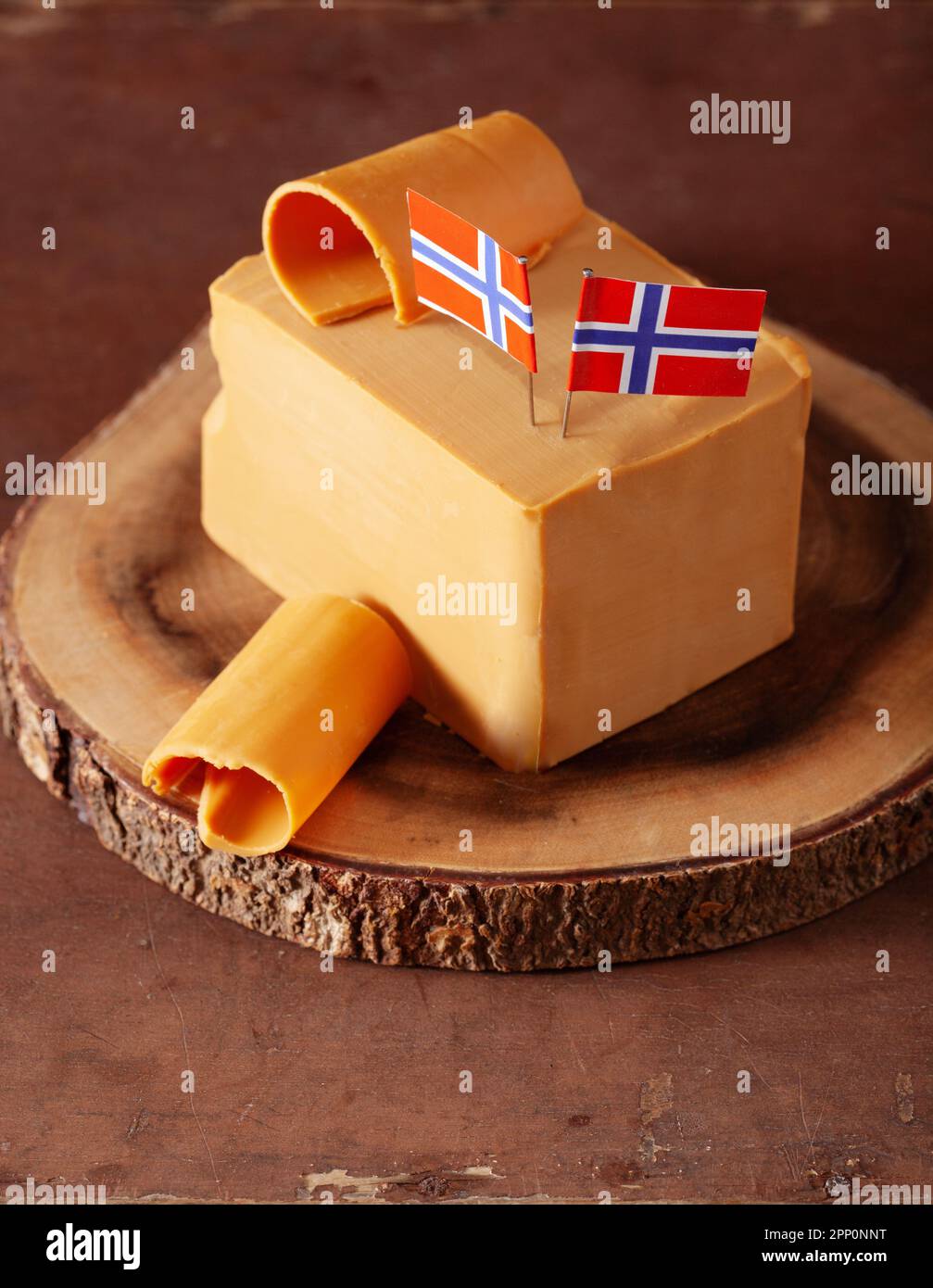 Norwegian brunost traditional brown cheese block Stock Photo - Alamy