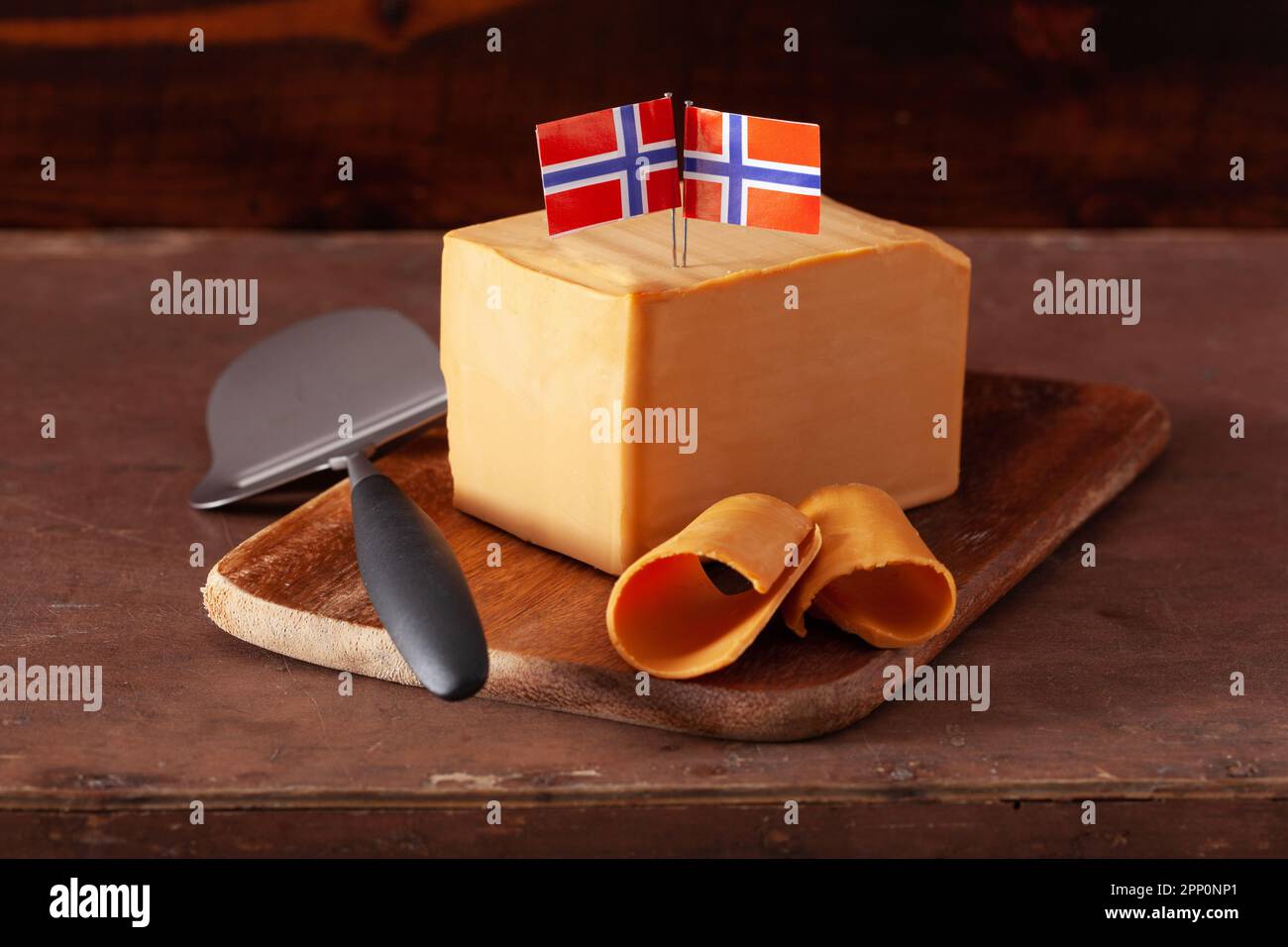 Norwegian brunost traditional brown cheese block Stock Photo - Alamy