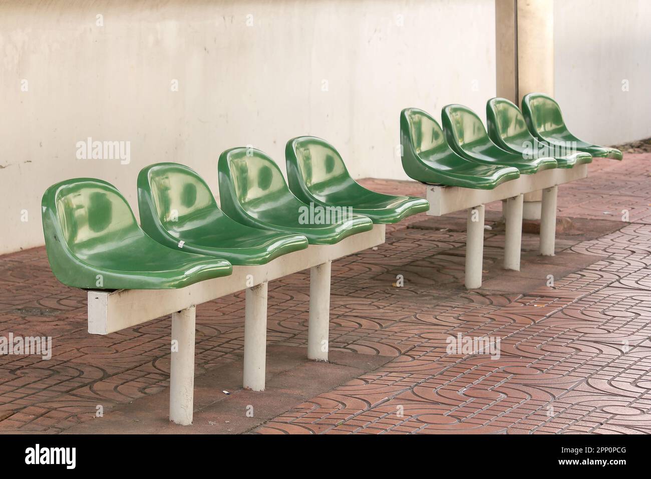 Green plastic chair at the bus stop For passengers waiting Stock Photo ...