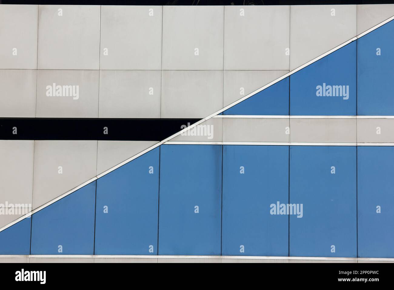 The glass wall used to decorate the building is translucent Stock Photo ...