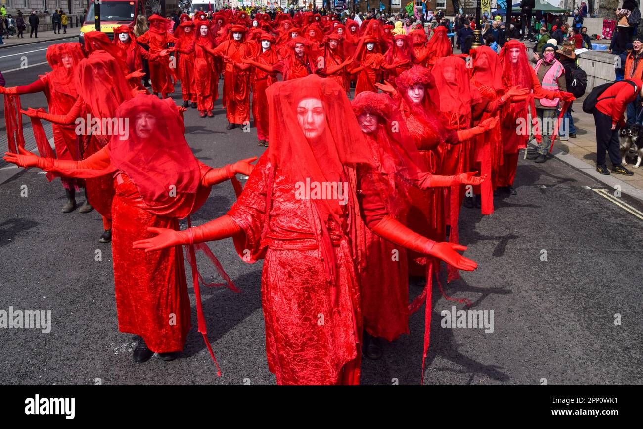London, UK. 21st April 2023. Red Rebels pass through Whitehall as ...