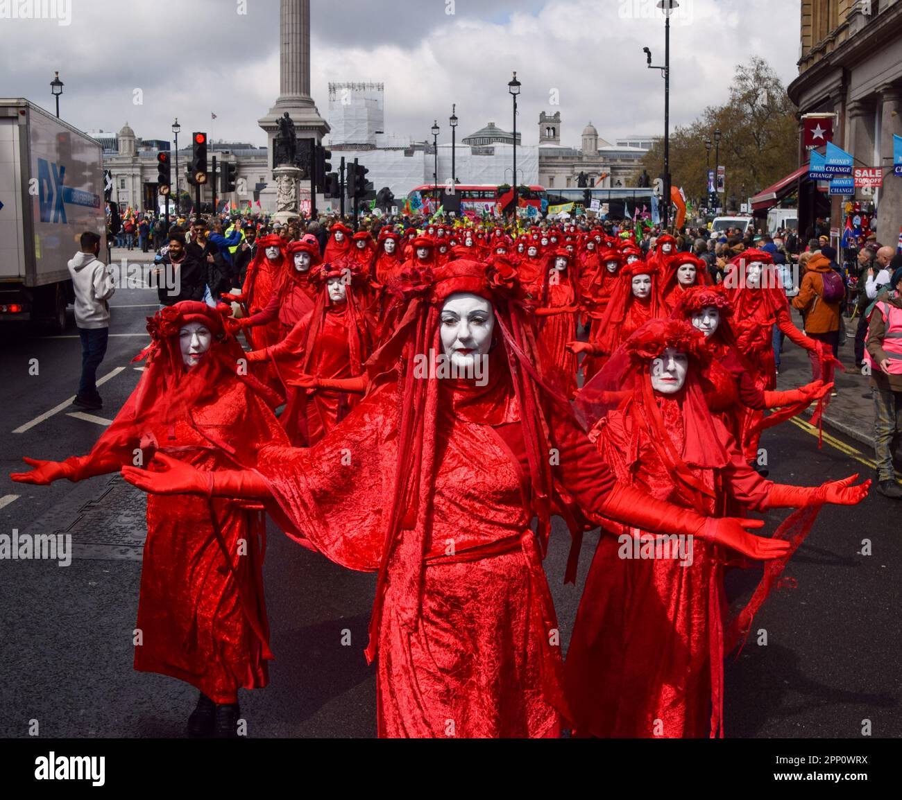 London, UK. 21st April 2023. Red Rebels pass through Whitehall as ...