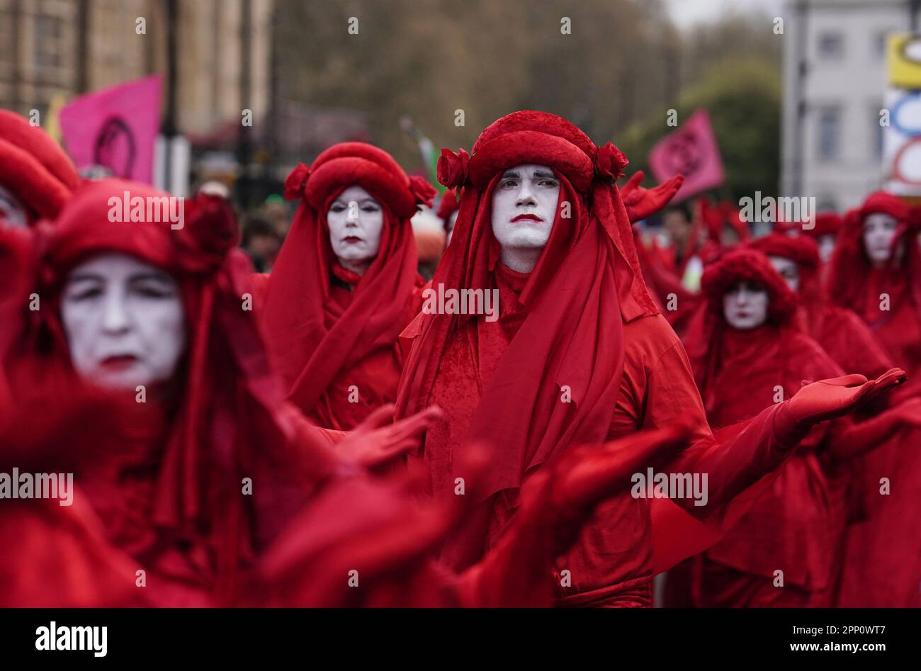 Members of the Red Rebel Brigade join Extinction Rebellion ...