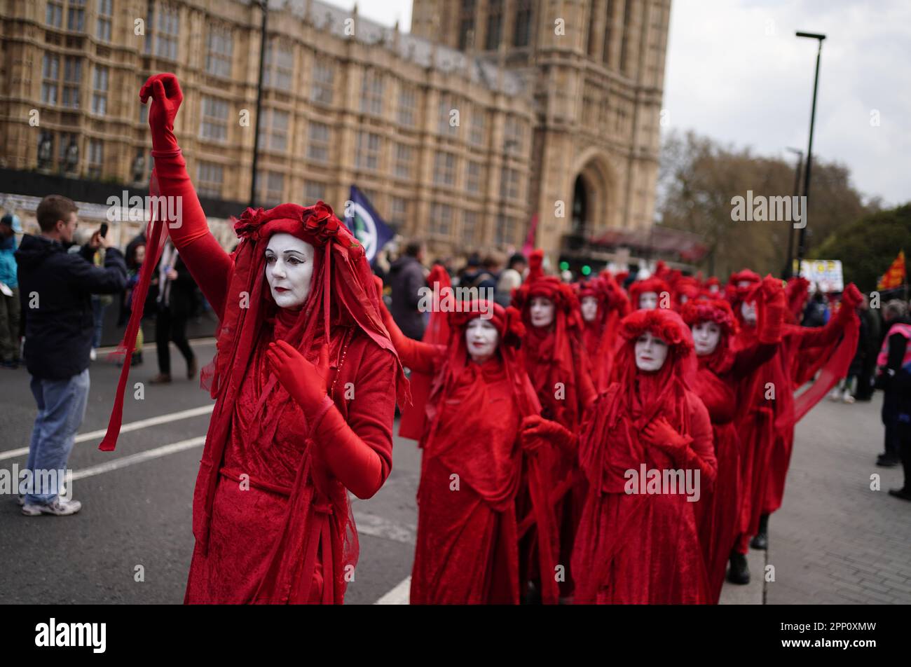 Members of the Red Rebel Brigade join Extinction Rebellion ...