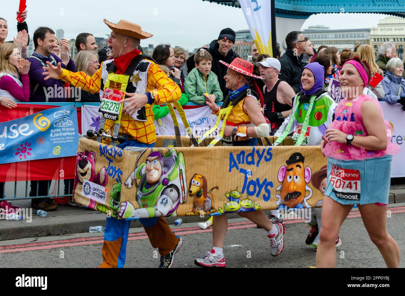 Runners in Toy Story costume competing in the Virgin Money London ...