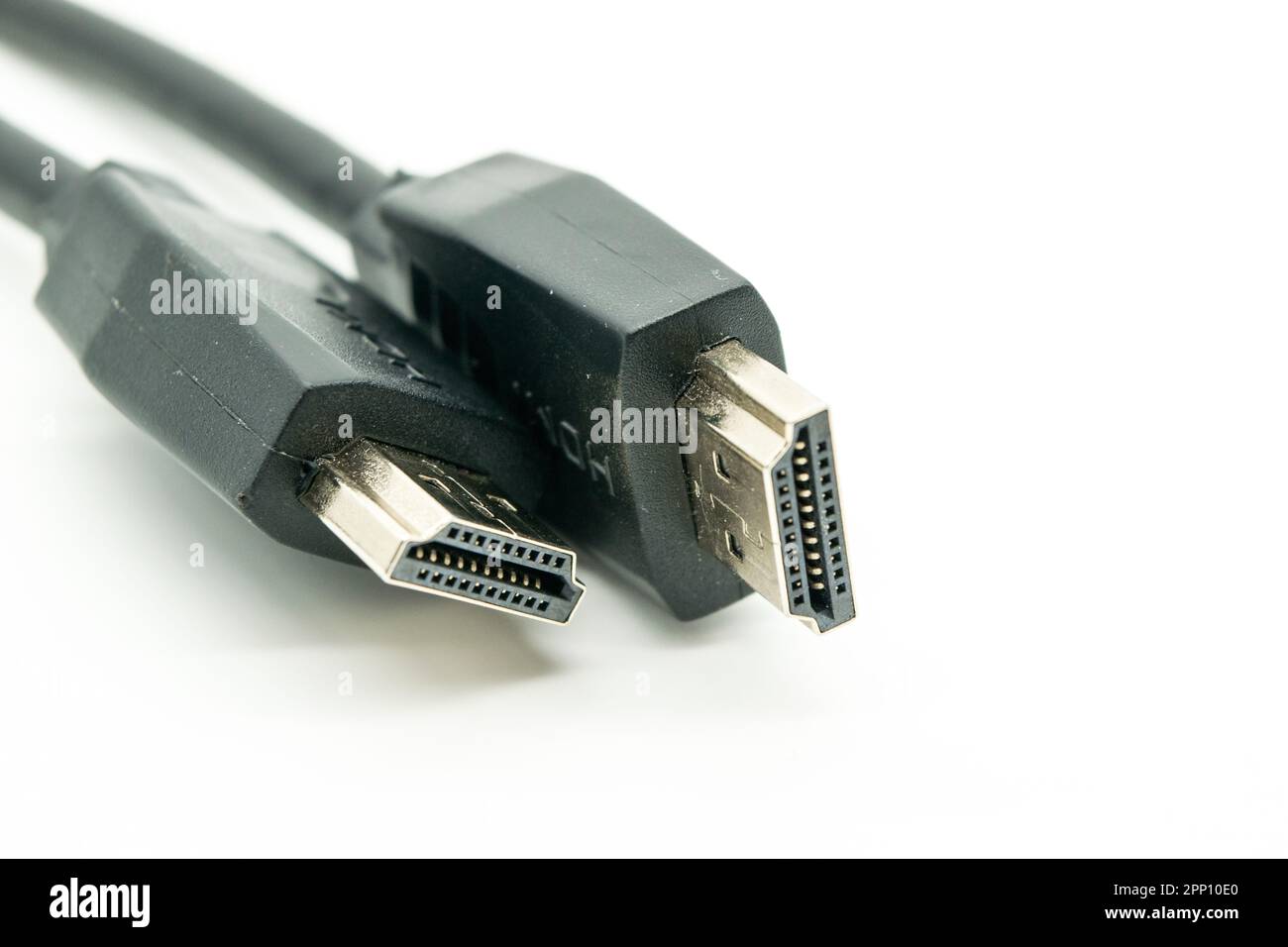 Close-up view of HDMI cables on a white background Stock Photo - Alamy